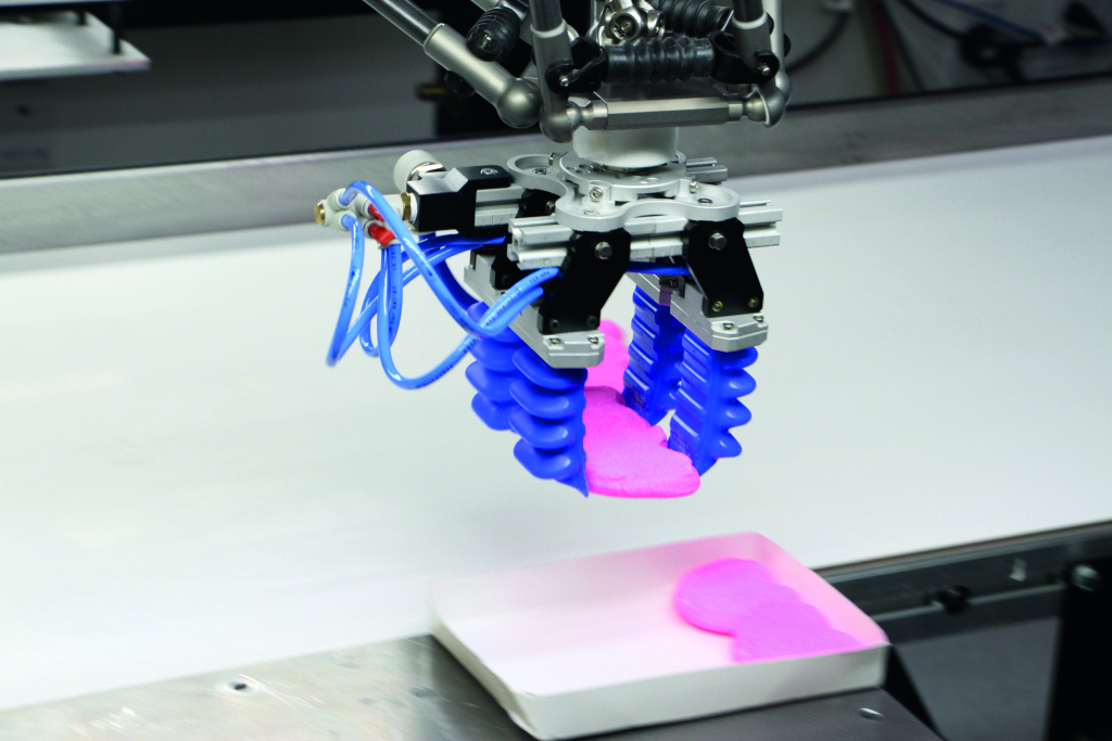 Präziser Greifer für die Verpackungsindustrie - ROBOTIK UND PRODUKTION